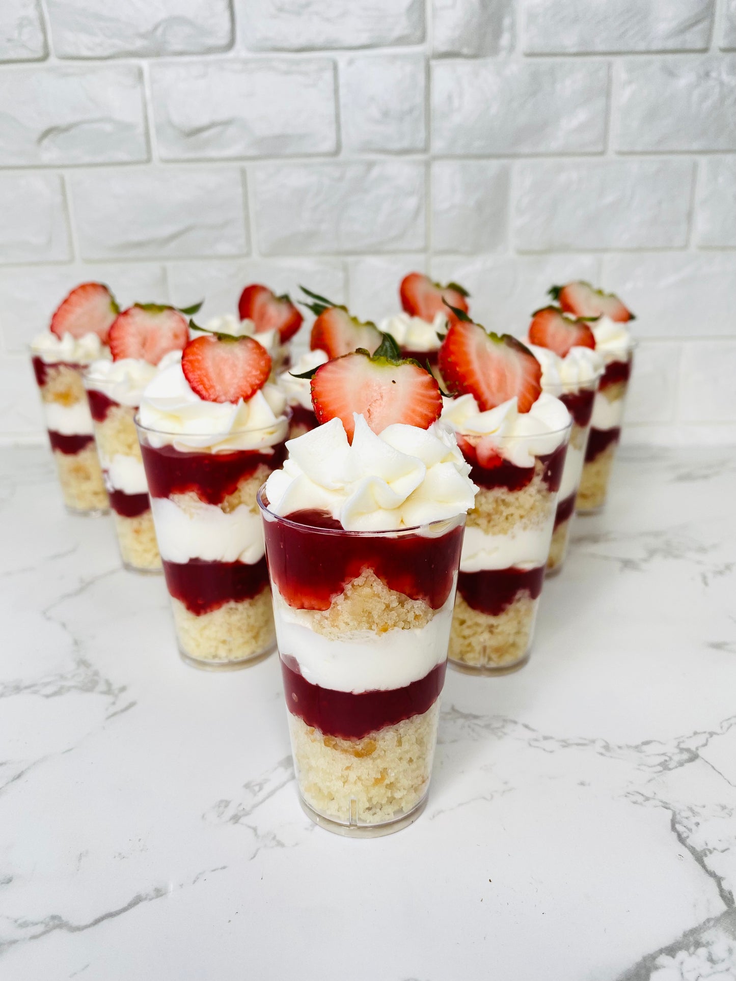12 Strawberry Shortcake Shooters – His & Her Cakery & Favors